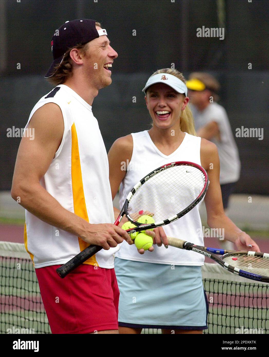 Buffalo Sabres' Jay McKee and his wife, Nicole, share a laugh prior to ...
