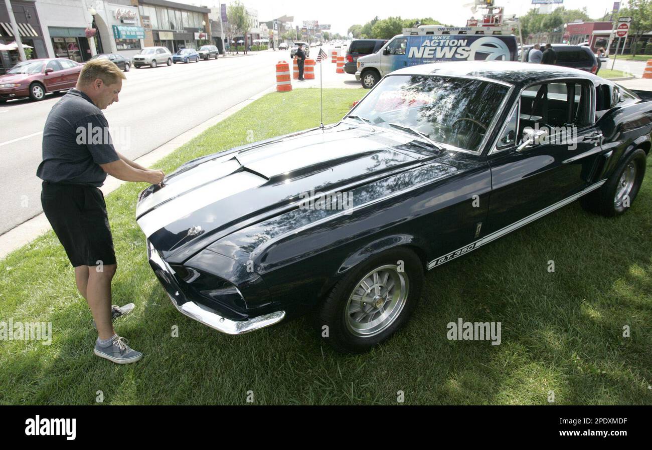 Jarrod Kings closes the hood on his 1967 Ford Shelby Mustang GT-350 in ...