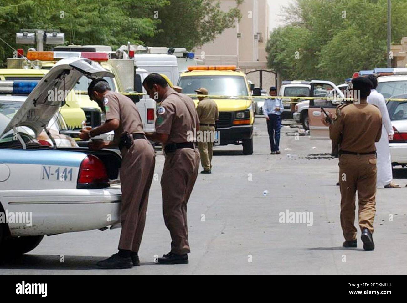 Saudi policmen are seen at the site of a shootout with militants in ...