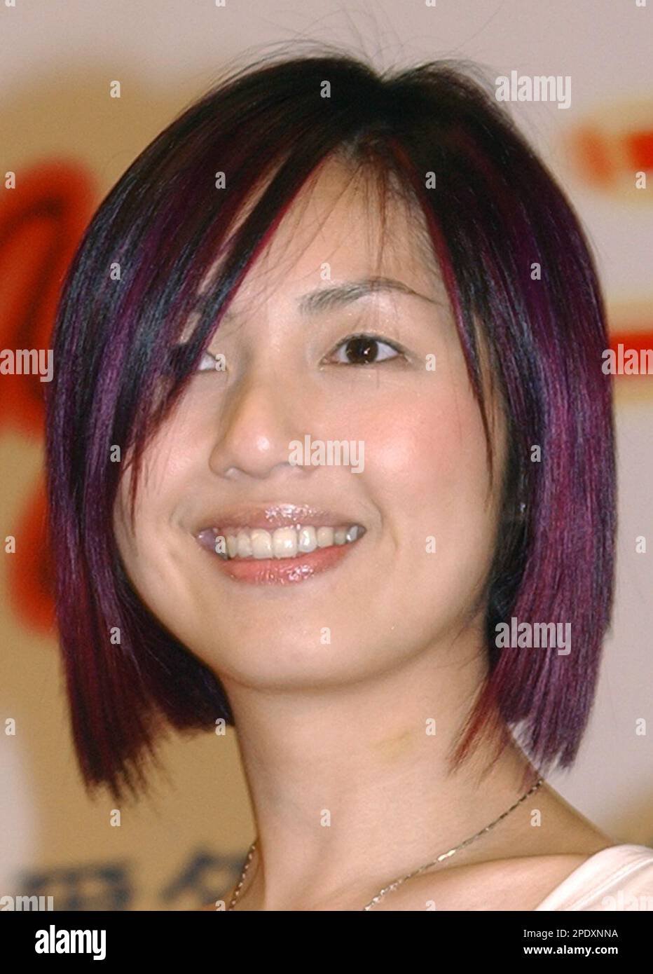 Hong Kong singer-actress Miriam Yeung poses for photographers during a ...