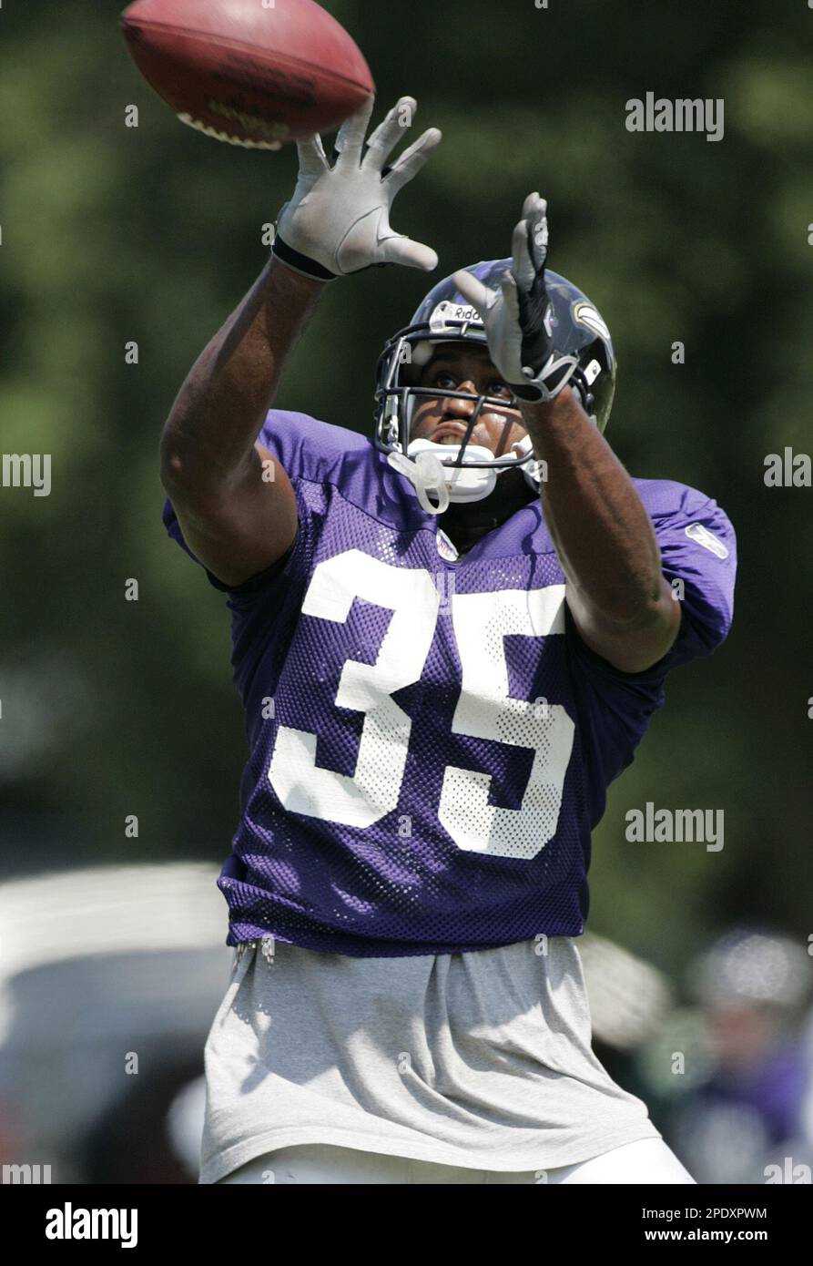 Baltimore Ravens running back Tellis Redmon grabs a pass during a drill ...