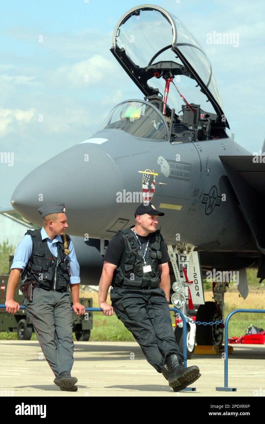 Russian security guards protect U.S. Air Force's F-15 fighter jet at ...