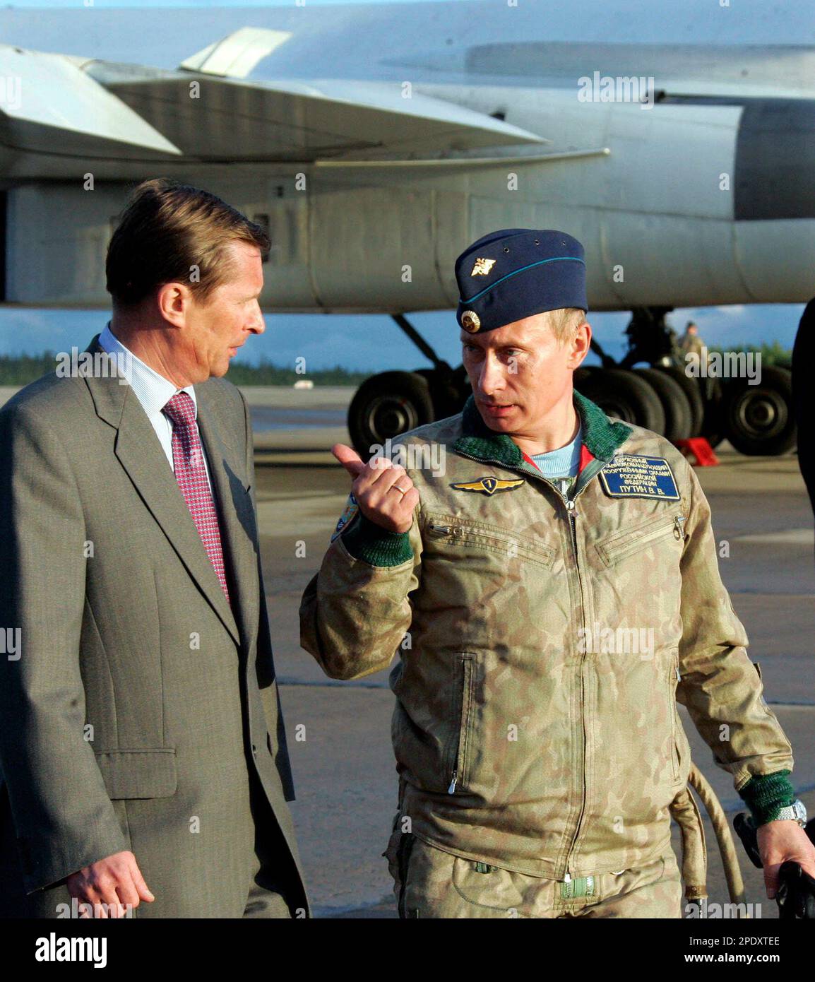 Wearing a flying gear and Air Force field cap Russian President ...