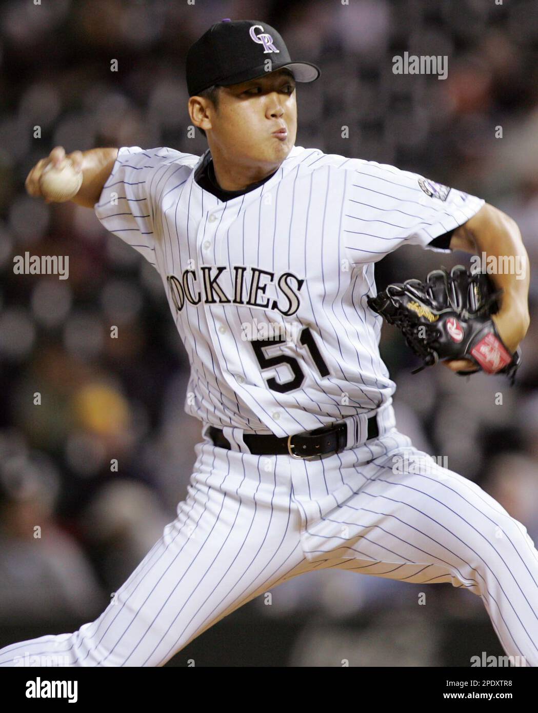 Colorado Rockies relief pitcher Sun-Woo Kim of South Korea delivers a ...