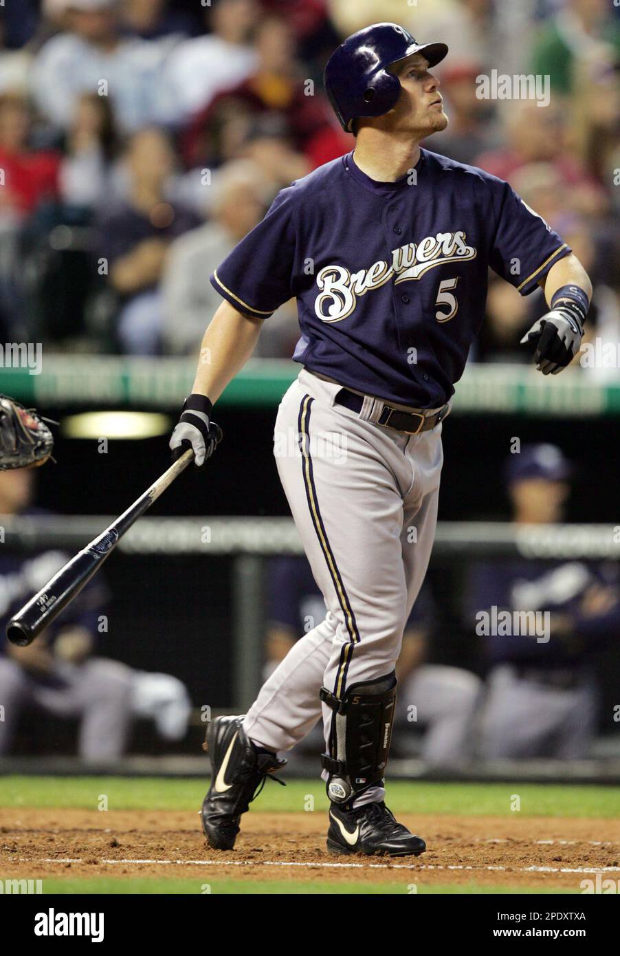Milwaukee Brewers' Geoff Jenkins follows the flight of his double off ...