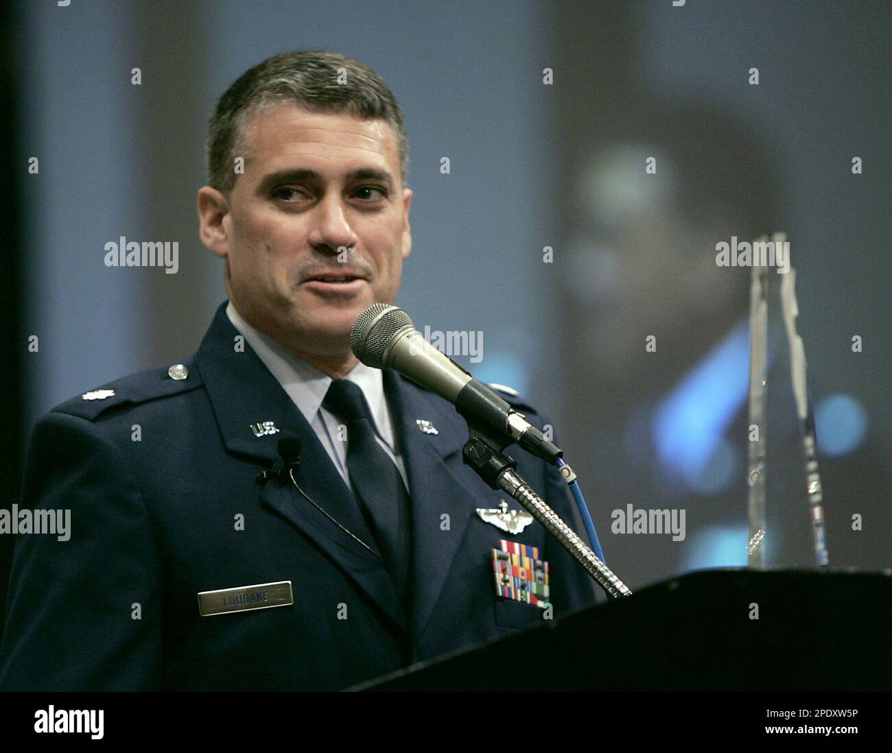U.S. Air Force Lt. Col. Andrew Lourake addresses the crowd at a ...