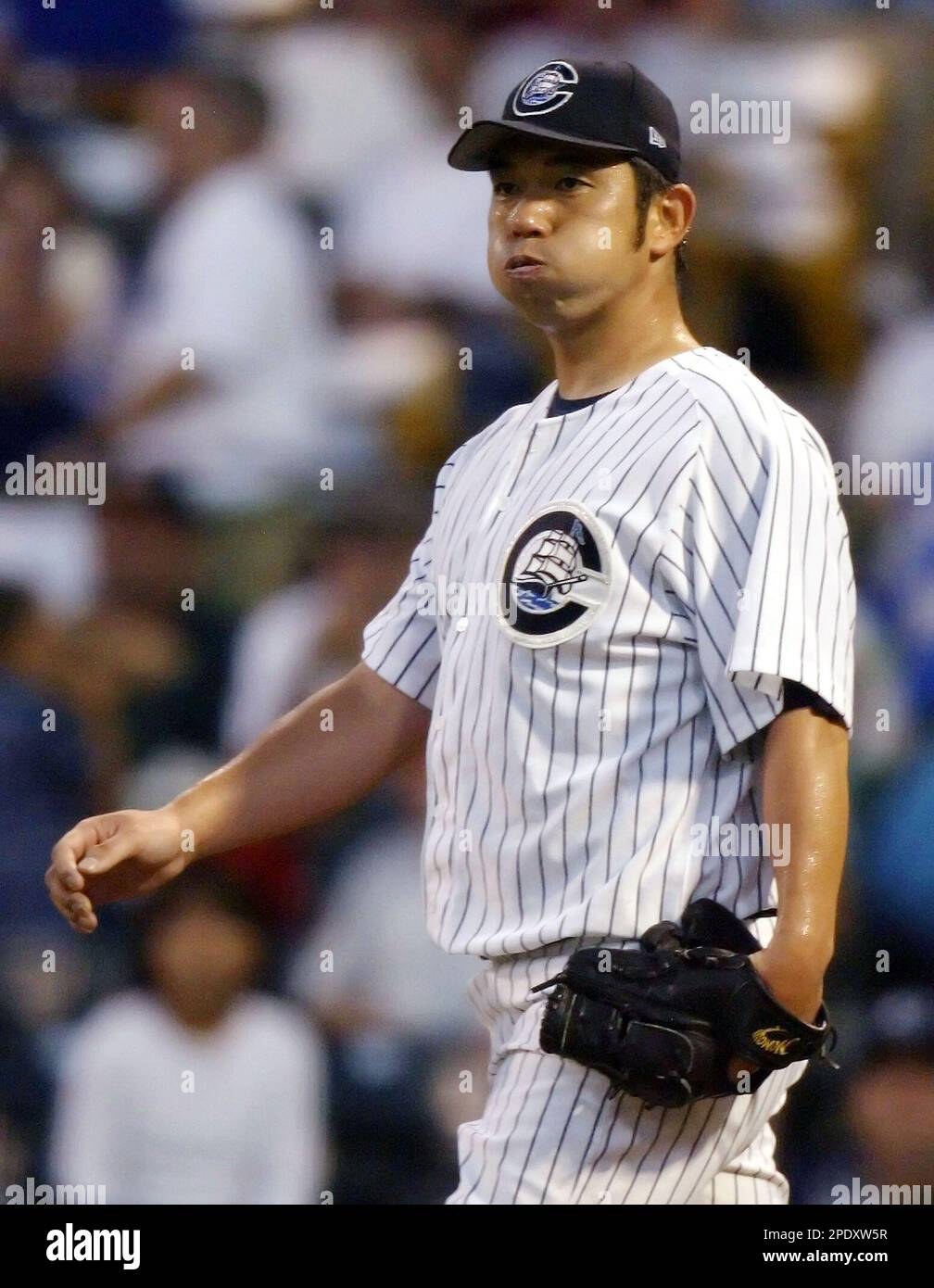 Columbus Clippers' Hideo Nomo lets out a sigh after giving up the ...