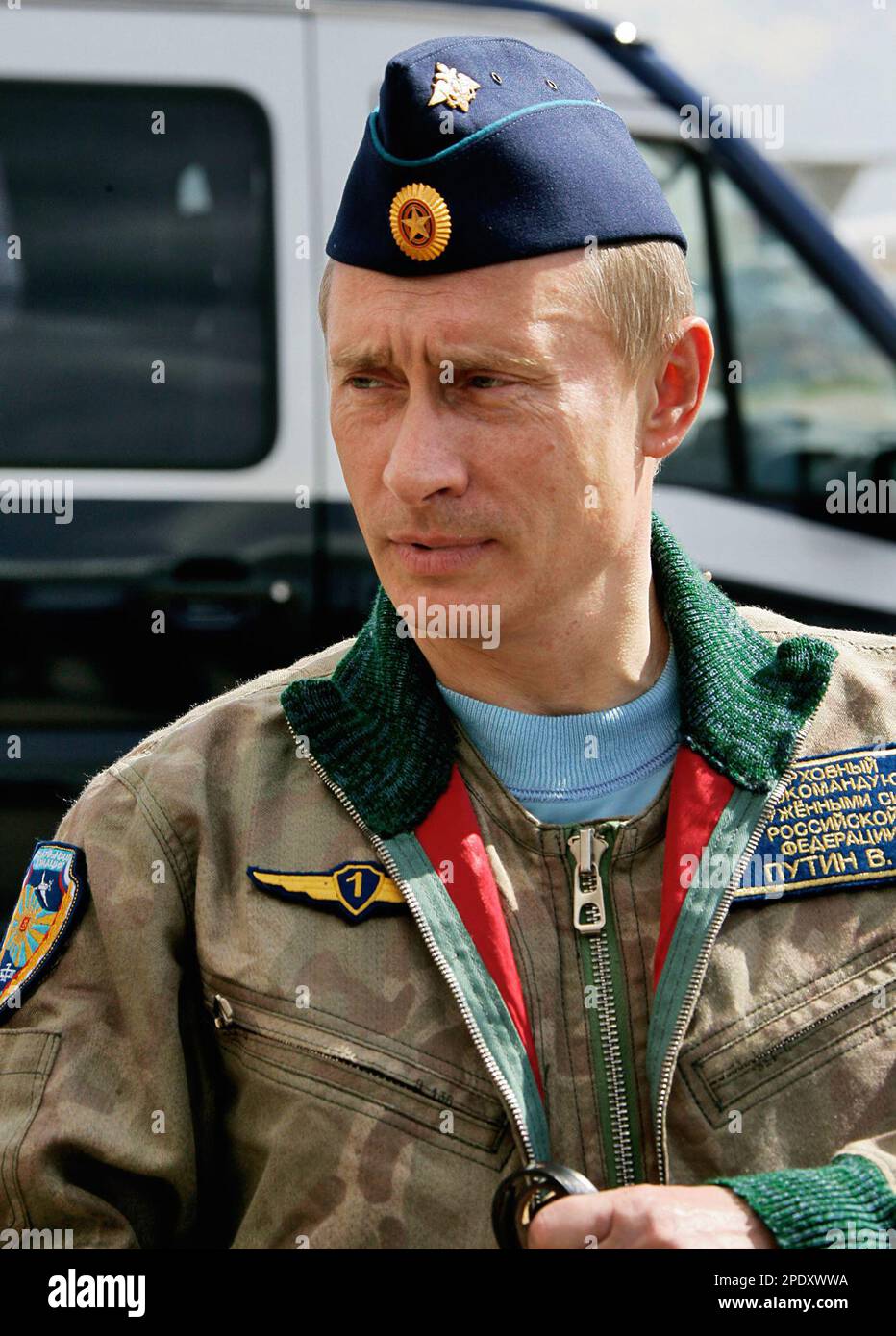 Russian President Vladimir Putin wearing a jump suit heads to a ...