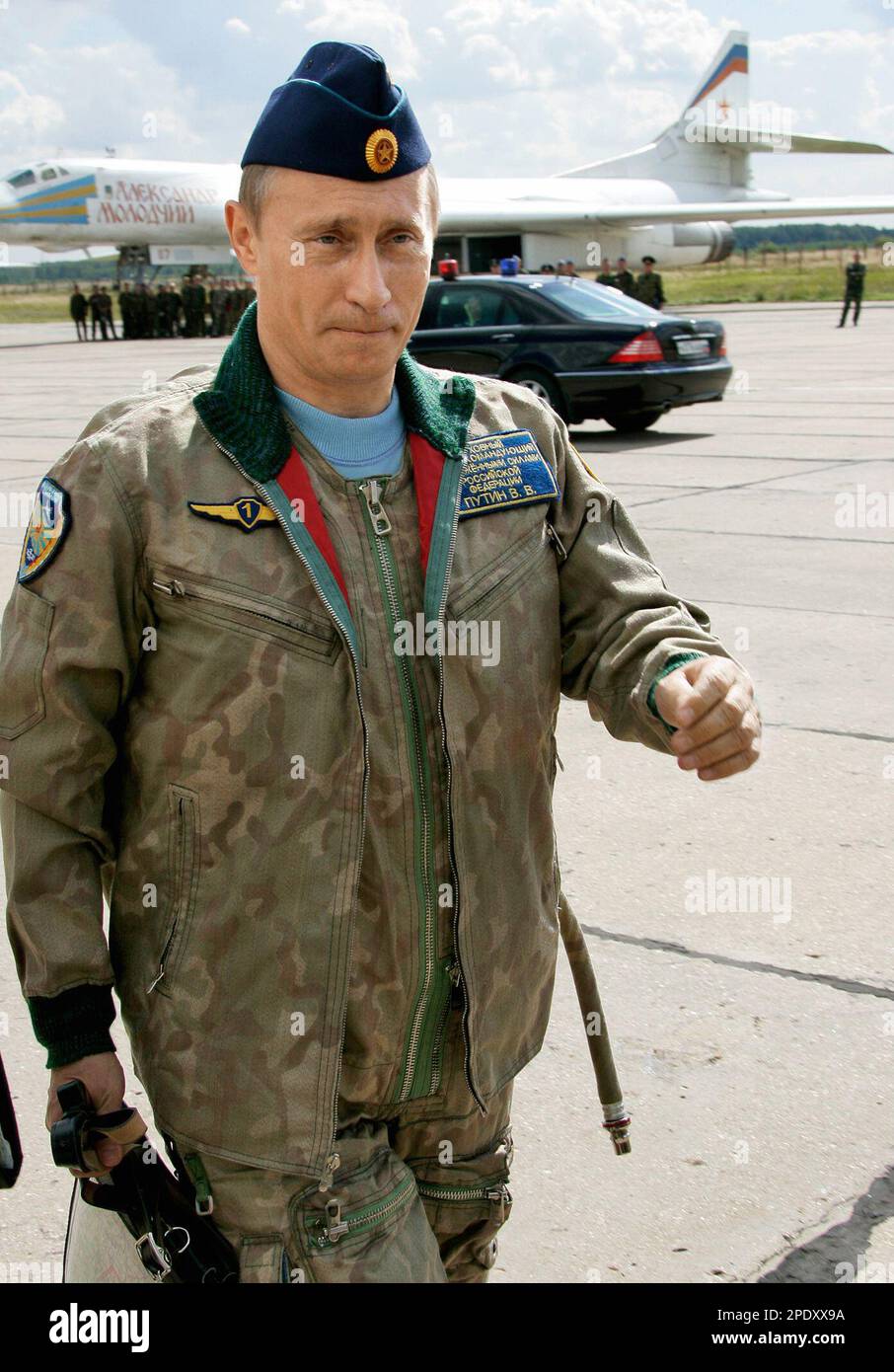 Russian President Vladimir Putin wearing a jump suit heads to a ...