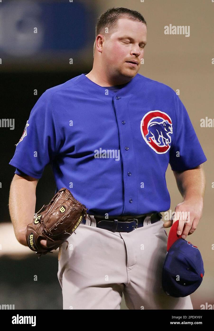 Chicago Cubs pitcher Glendon Rusch pauses on the mound after a visit ...