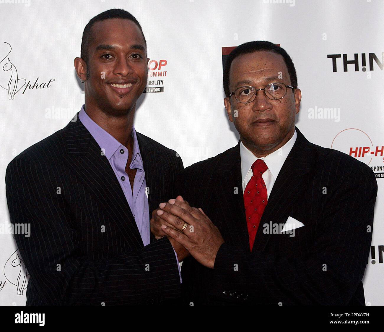Filmmaker Keith Beauchamp, left, stands with Hip-Hop Summit Action ...