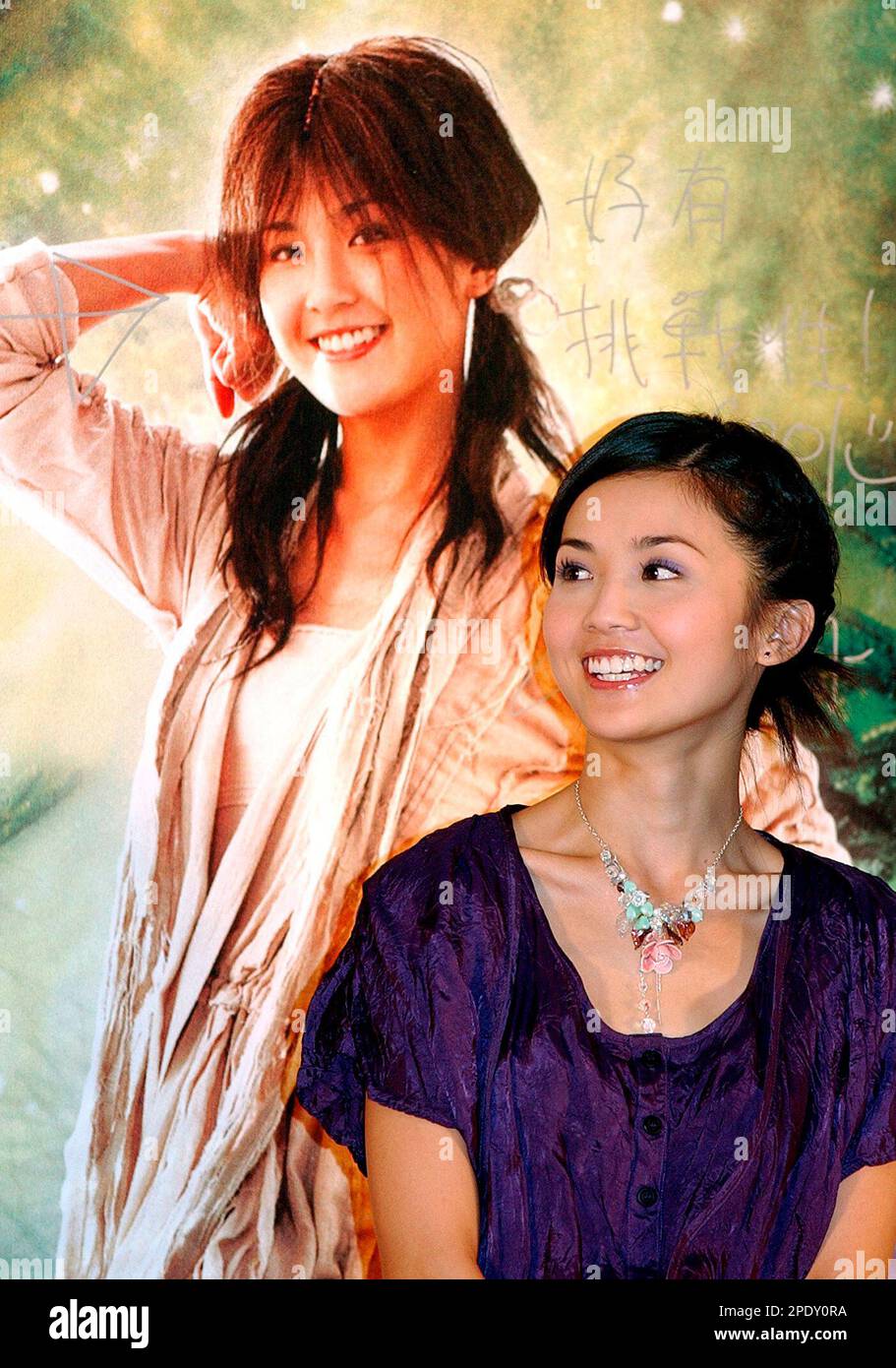 Hong Kong actress Charlene Choi poses for photographers during a ...