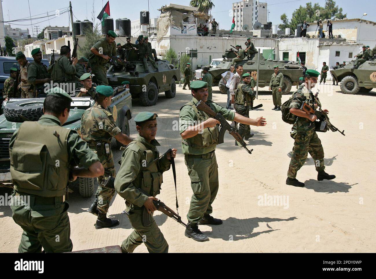 Palestinian security forces gather in a police compound in Khan Younis ...
