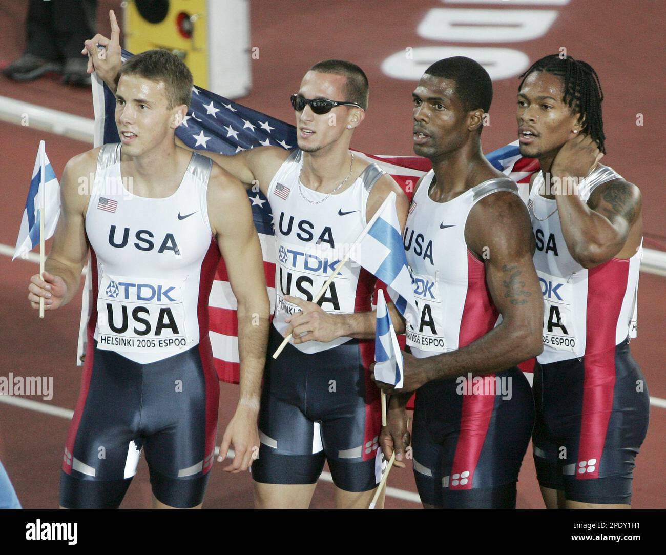The gold medal winning US team, from left: Andrew Rock, Jeremy Wariner ...