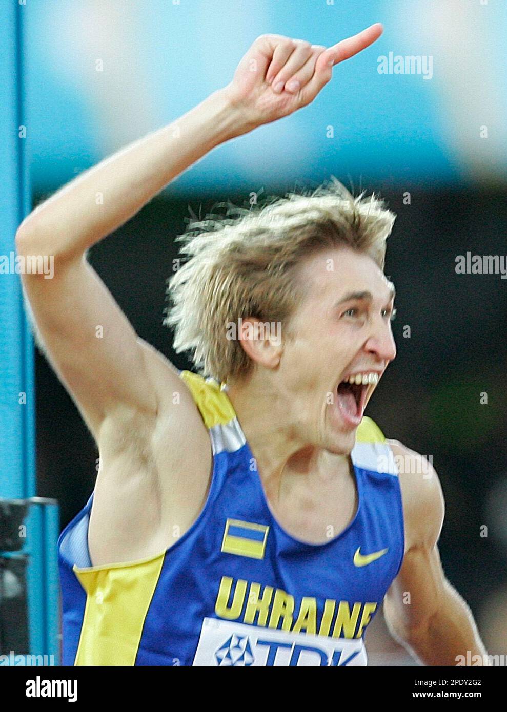 Yuriy Krymarenko of Ukraine celebrates as he makes the winning jump to ...