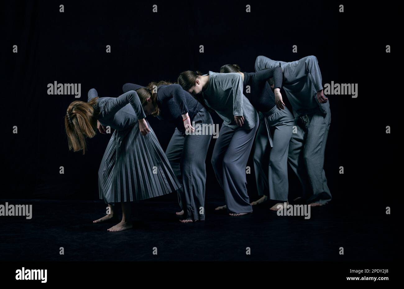 Inner chaos and self-expression. Group of young people dancing contemp ...