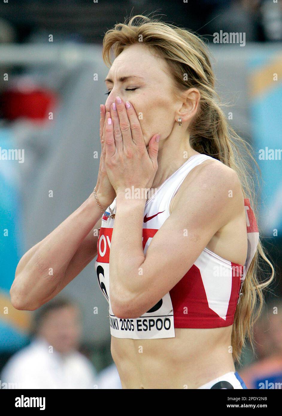 Russia's Tatyana Tomashova reacts after taking the gold medal in the ...