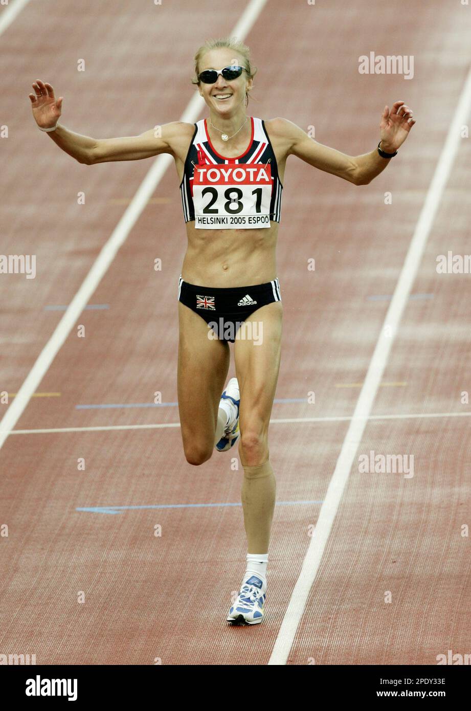 Britain's Paula Radcliffe reaches the line to win the gold medal in the ...