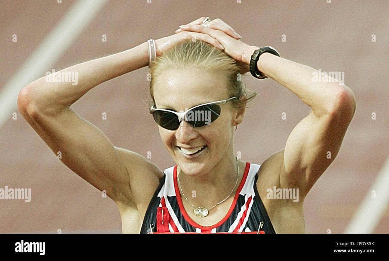 Britain's Paula Radcliffe reacts after winning the gold medal in the ...