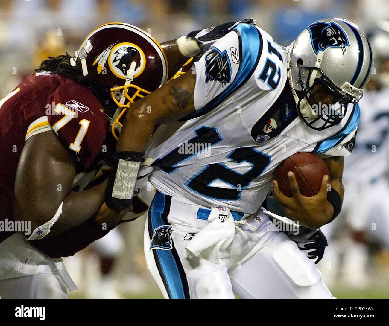 Carolina Panthers quarterback Rod Rutherford (12) is sacked by ...