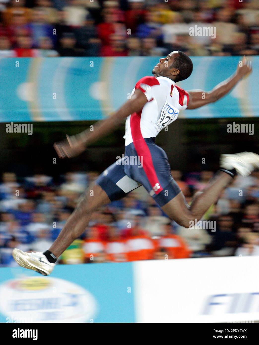 Dwight Phillips of the US on his way to winning the gold medal in the ...