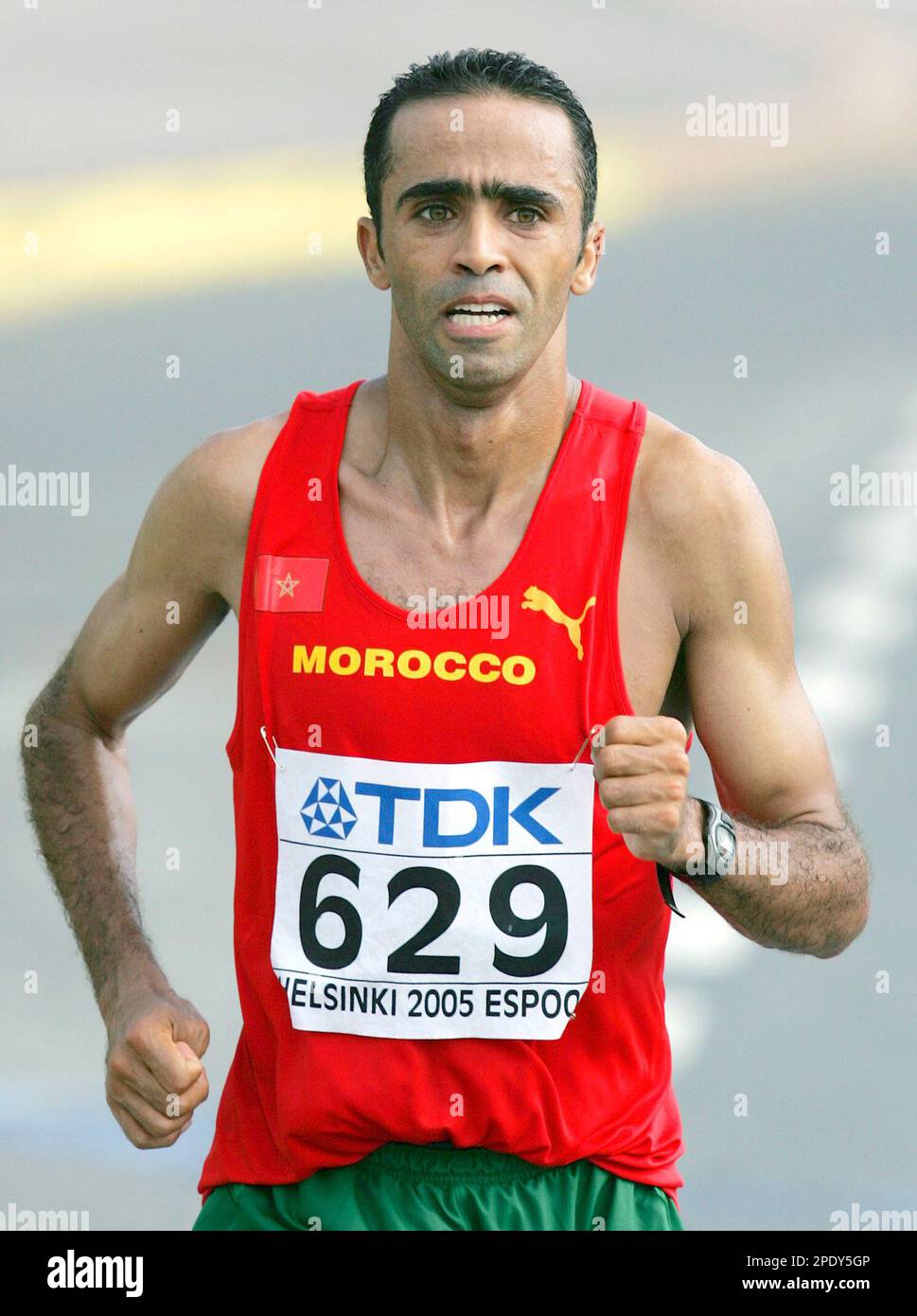 Jaouad Gharib of Morocco strains on his way to win the Men's marathon ...
