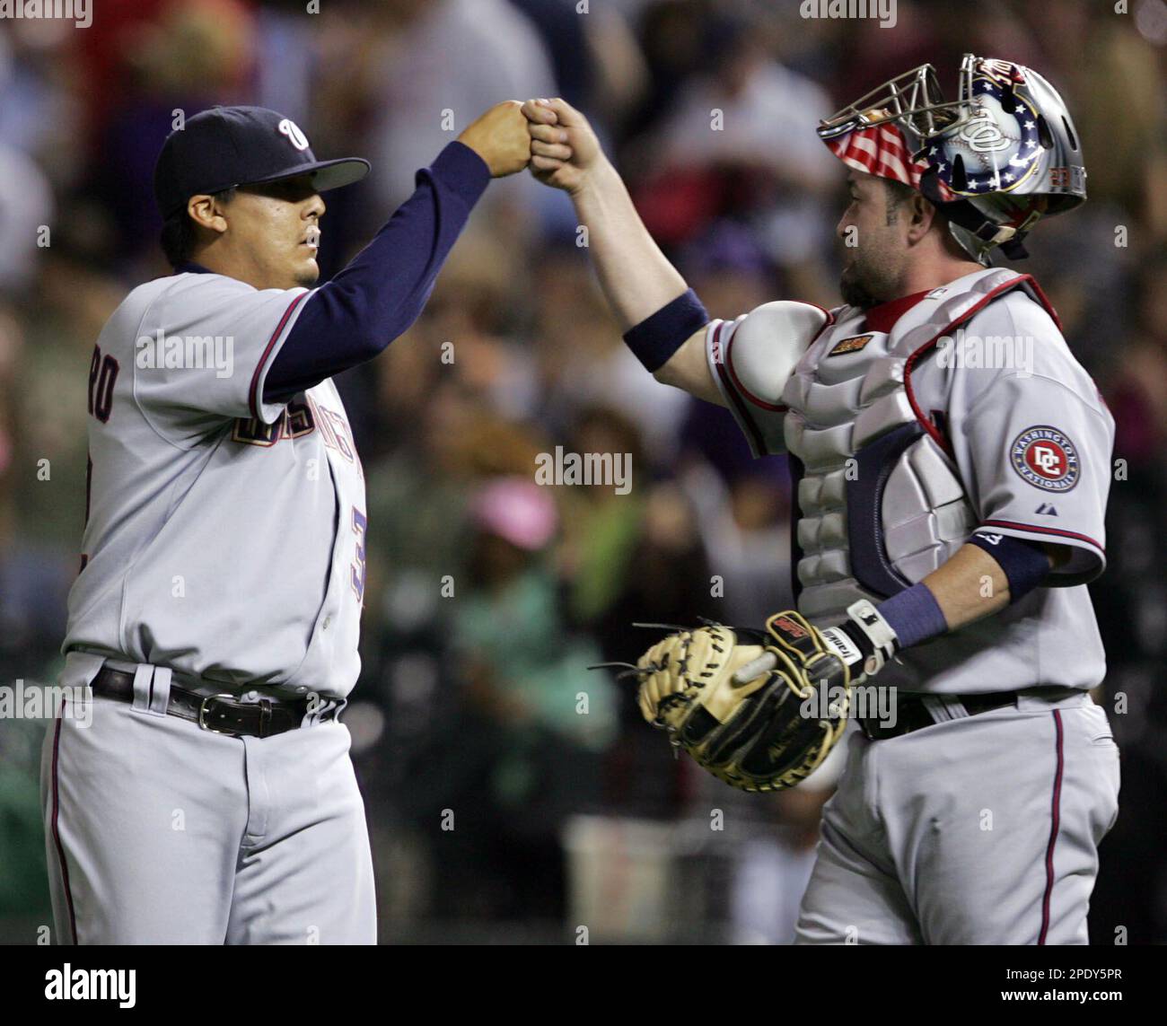 Washington Nationals relief pitcher Chad Cordero, left, celebrates with ...
