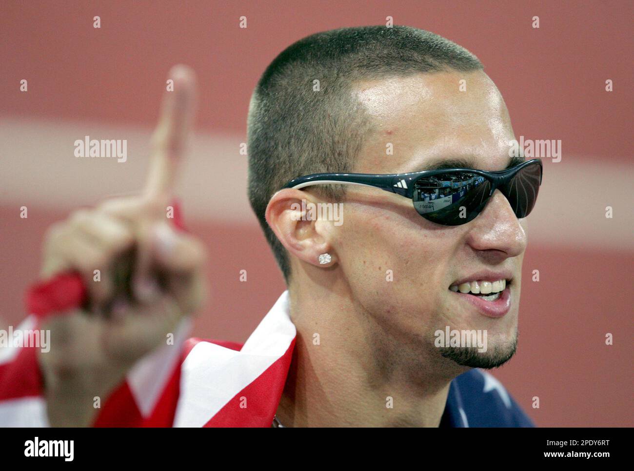 Jeremy Wariner of the USA celebrates after he won the gold medal in the ...