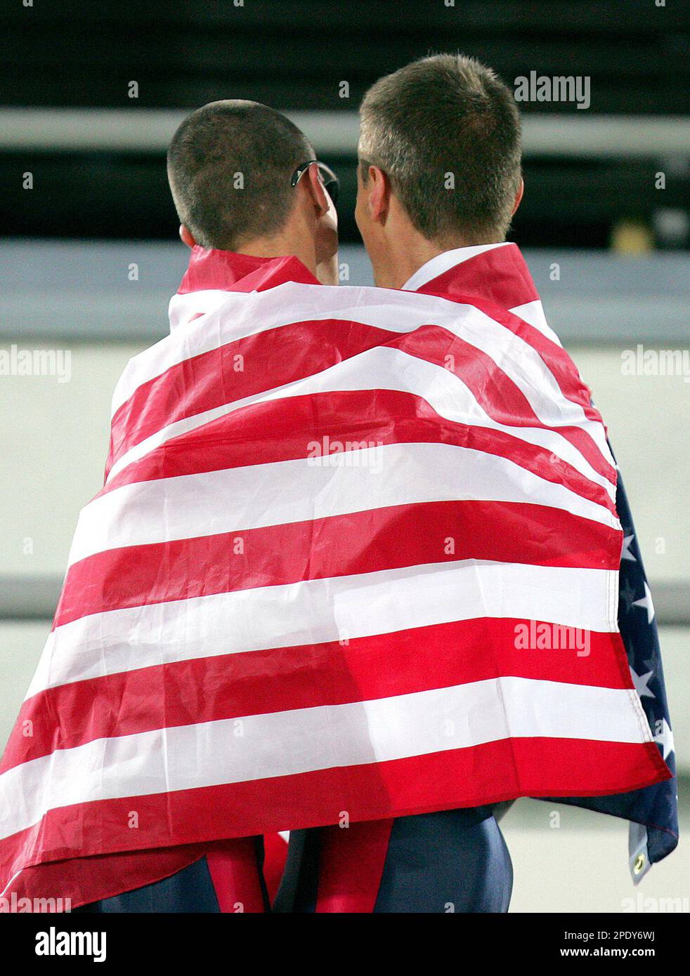 Jeremy Wariner of the USA, left, the gold medal winner in the Men's 400 ...