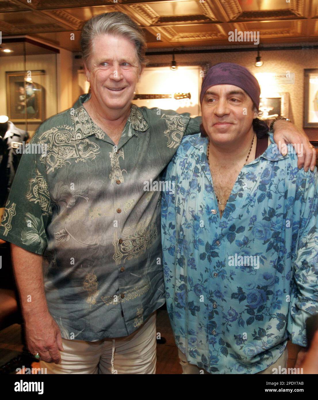 Rock guitarist and actor Steven Van Zandt, right, poses with former ...