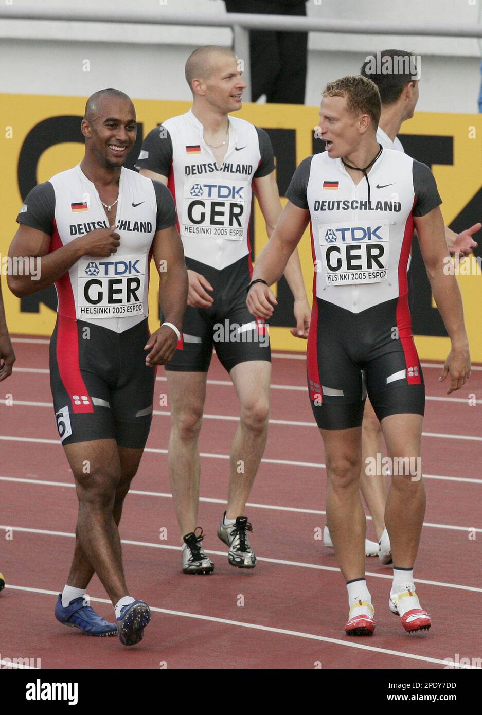 Germany's 4x100 relay team leave the track after finishing third in the ...