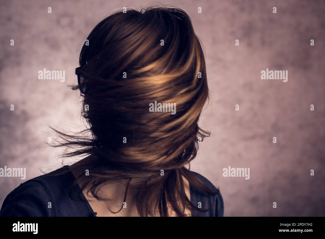 Girl with hair covering face hi-res stock photography and images - Alamy