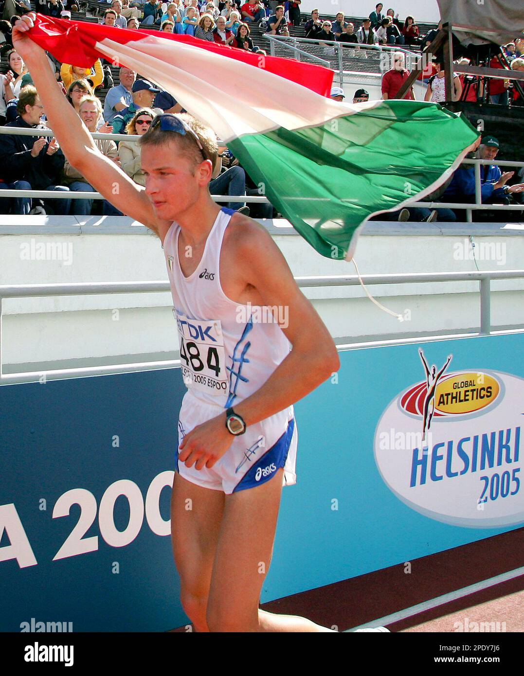 Alex Schwazer of Italy celebrates after winning the bronze medal in the ...