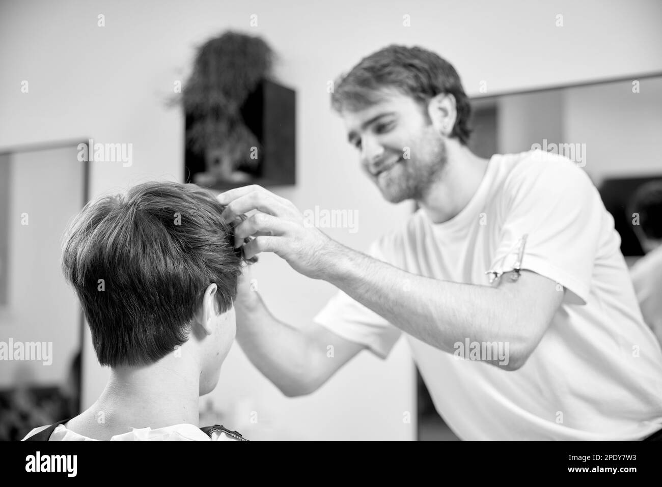 Barber barbershop getting haircut Black and White Stock Photos & Images ...