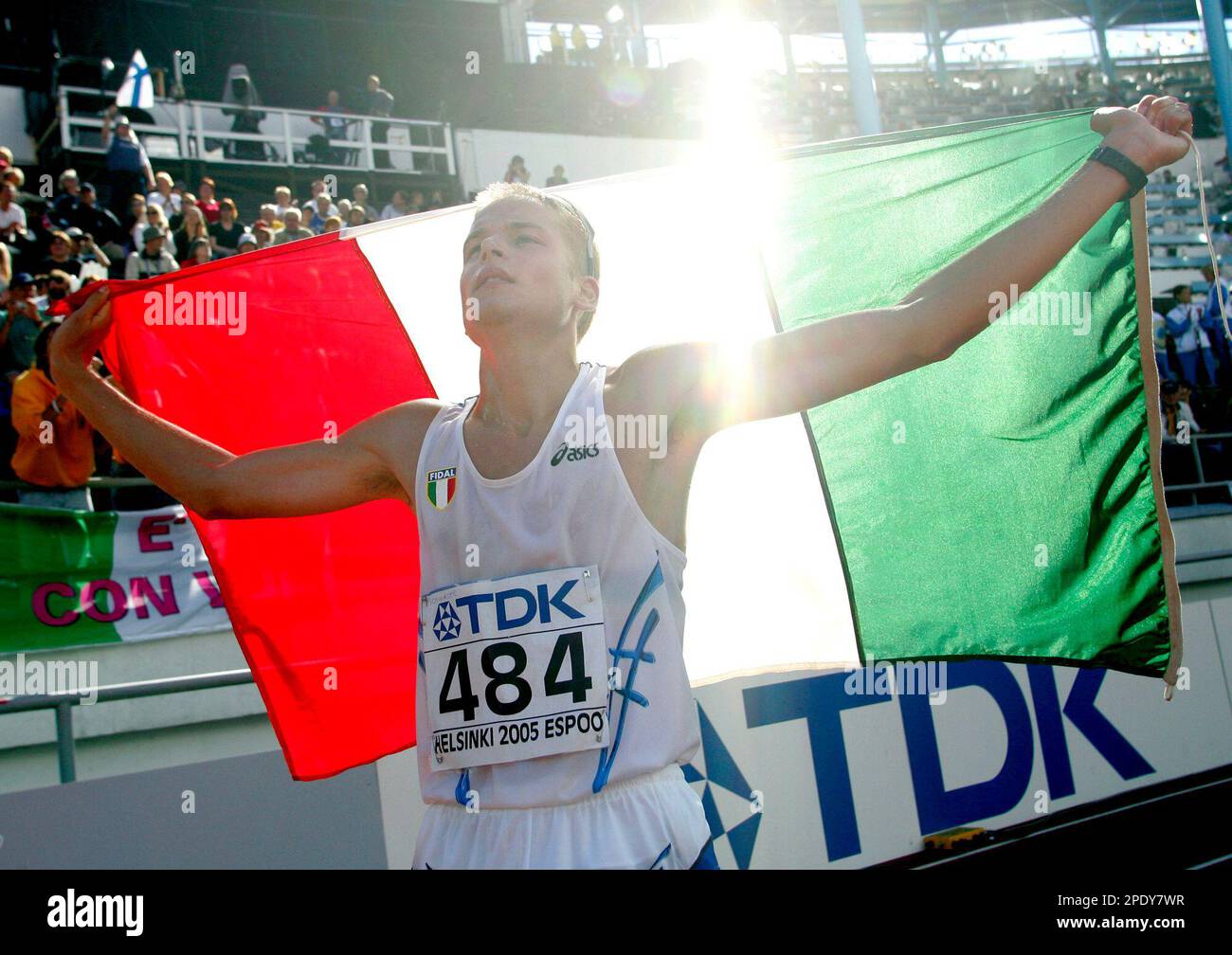 Alex Schwazer of Italy celebrates after winning the bronze medal in the ...