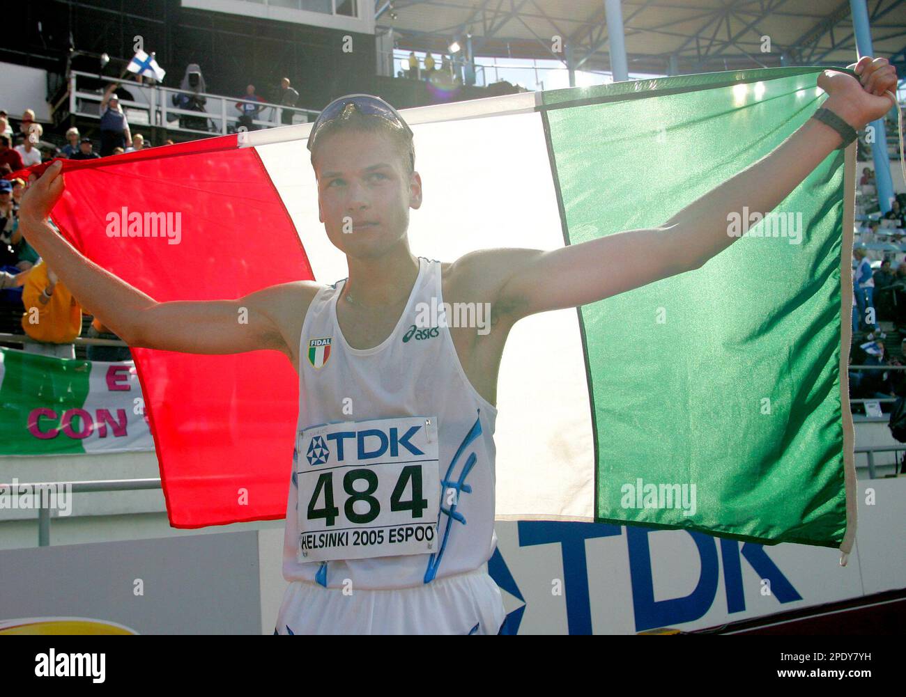 Alex Schwazer of Italy celebrates after winning the bronze medal in the ...