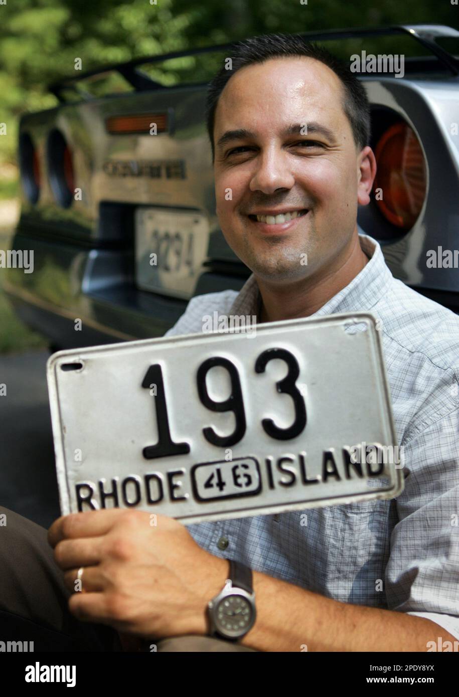 License plate collector John Raiche of Coventry, R.I., displays a 1946 ...