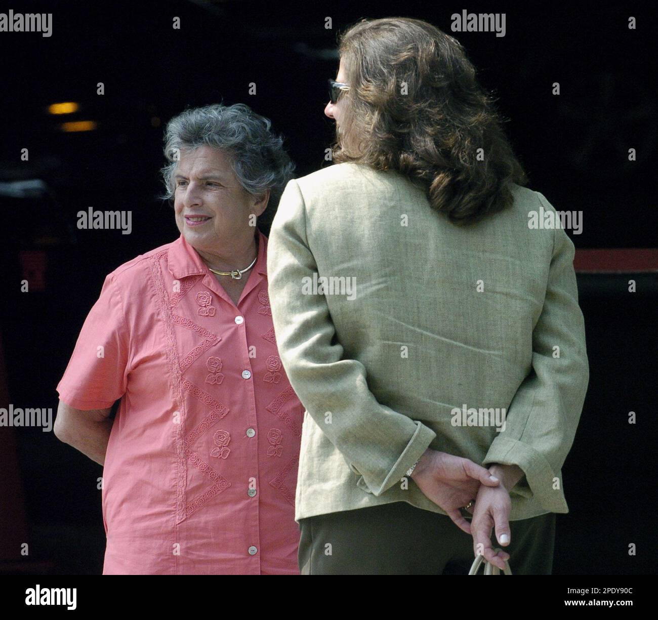 Martin Grass' mother Lois Grass, left, and his wife, Jody Grass, wait ...