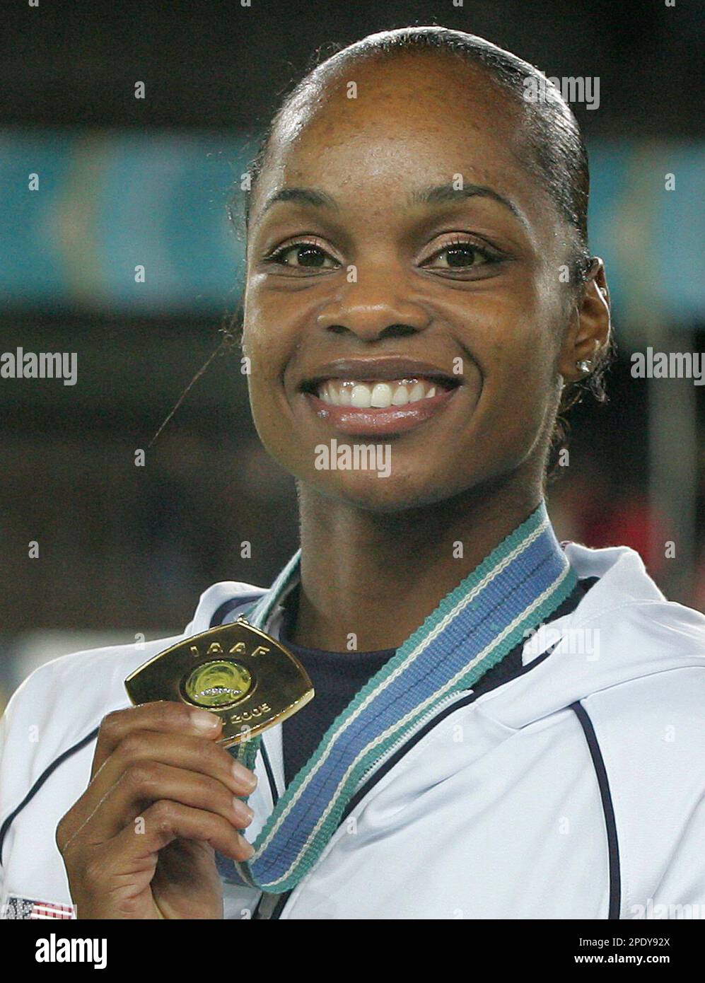 Michelle Perry of the United States shows the gold medal she won in the ...