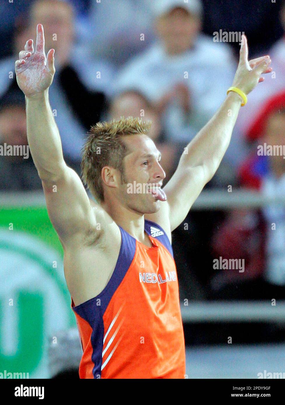 Rens Blom of the Netherlands celebrates clearing the bar on his way to ...