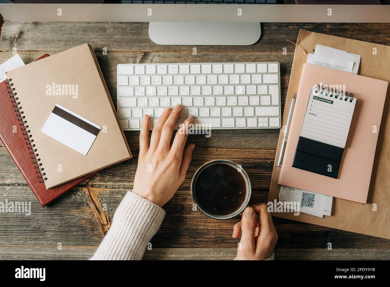 Top view of female hands typing on a computer keyboard. Business woman ...