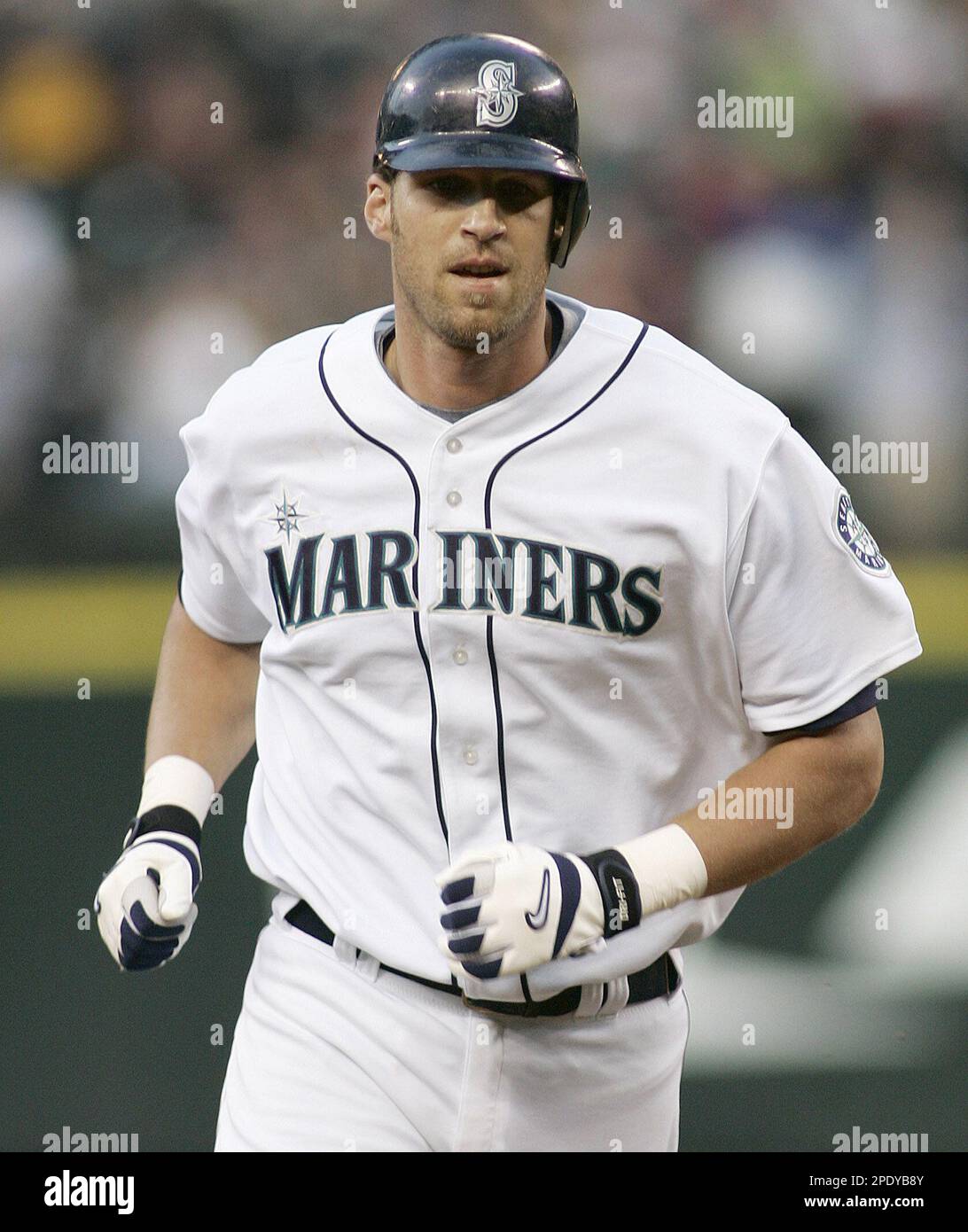 Seattle Mariners' Richie Sexson runs the bases after hitting a solo ...