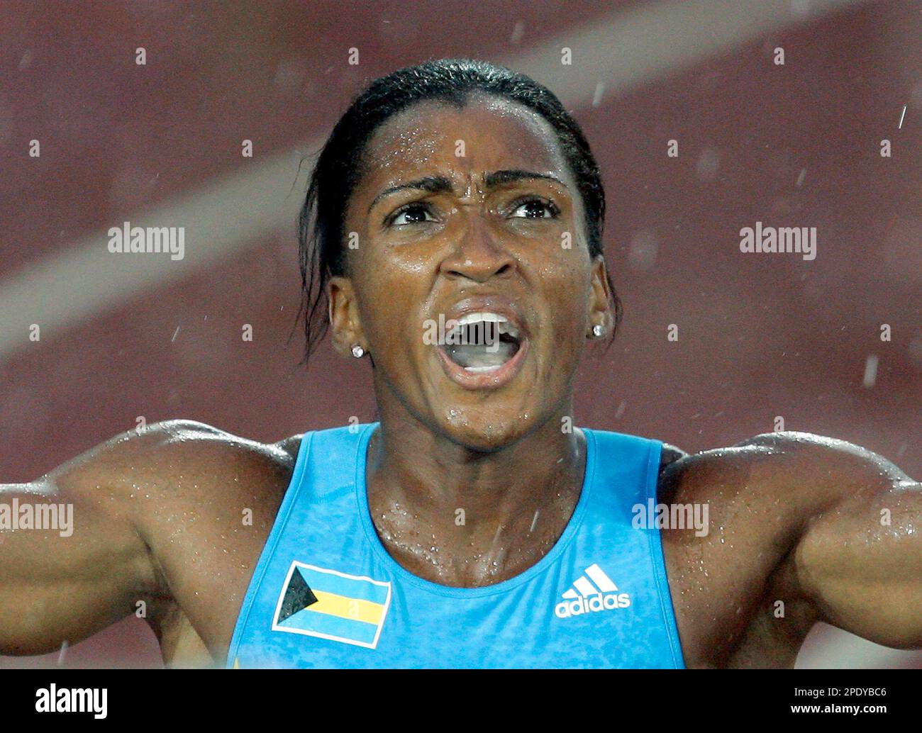 Tonique Williams-Darling of the Bahamas reacts after she won the Women ...