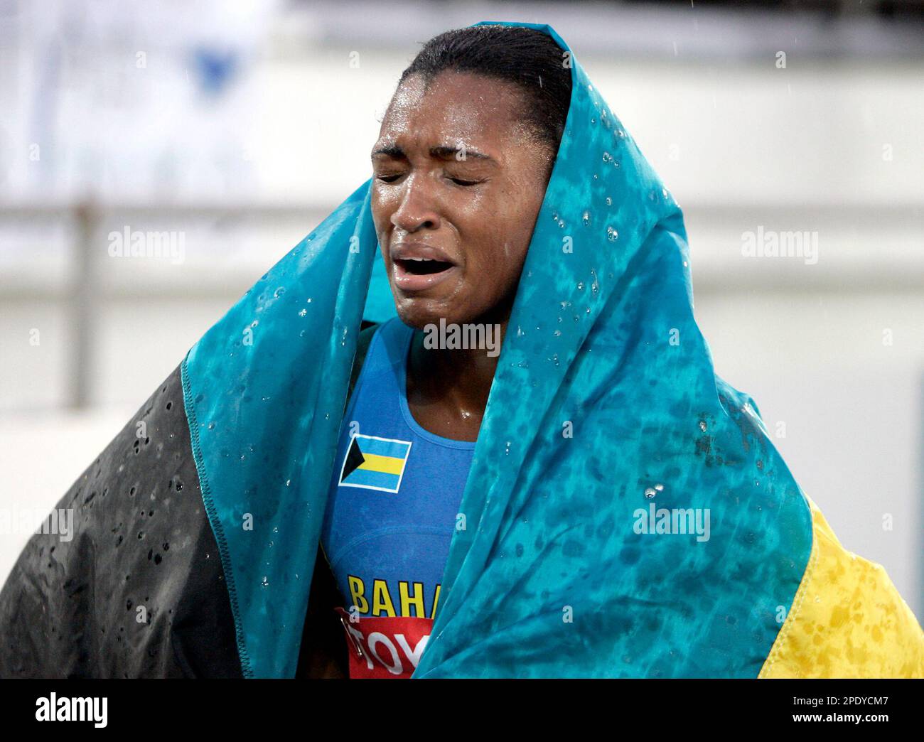 Tonique Williams-Darling of the Bahamas reacts after she won the Women ...