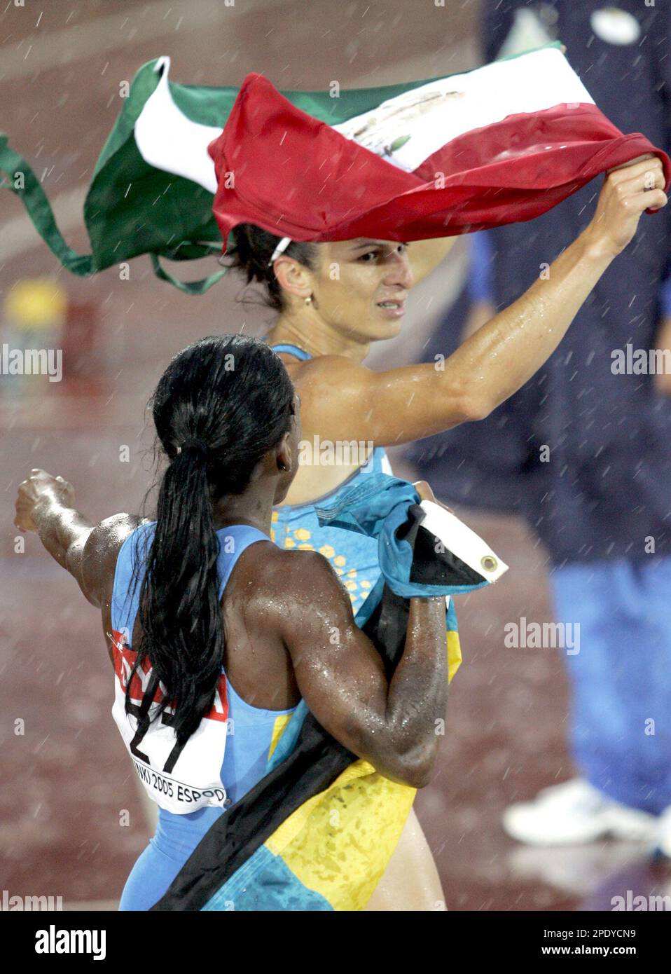 Gold medalist Tonique Williams-Darling of the Bahamas, bottom ...