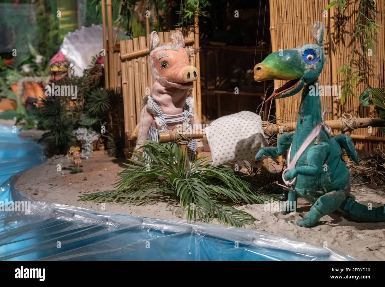 Augsburg, Germany. 15th Mar, 2023. Urmel aus dem Eis (r) stands next to ...