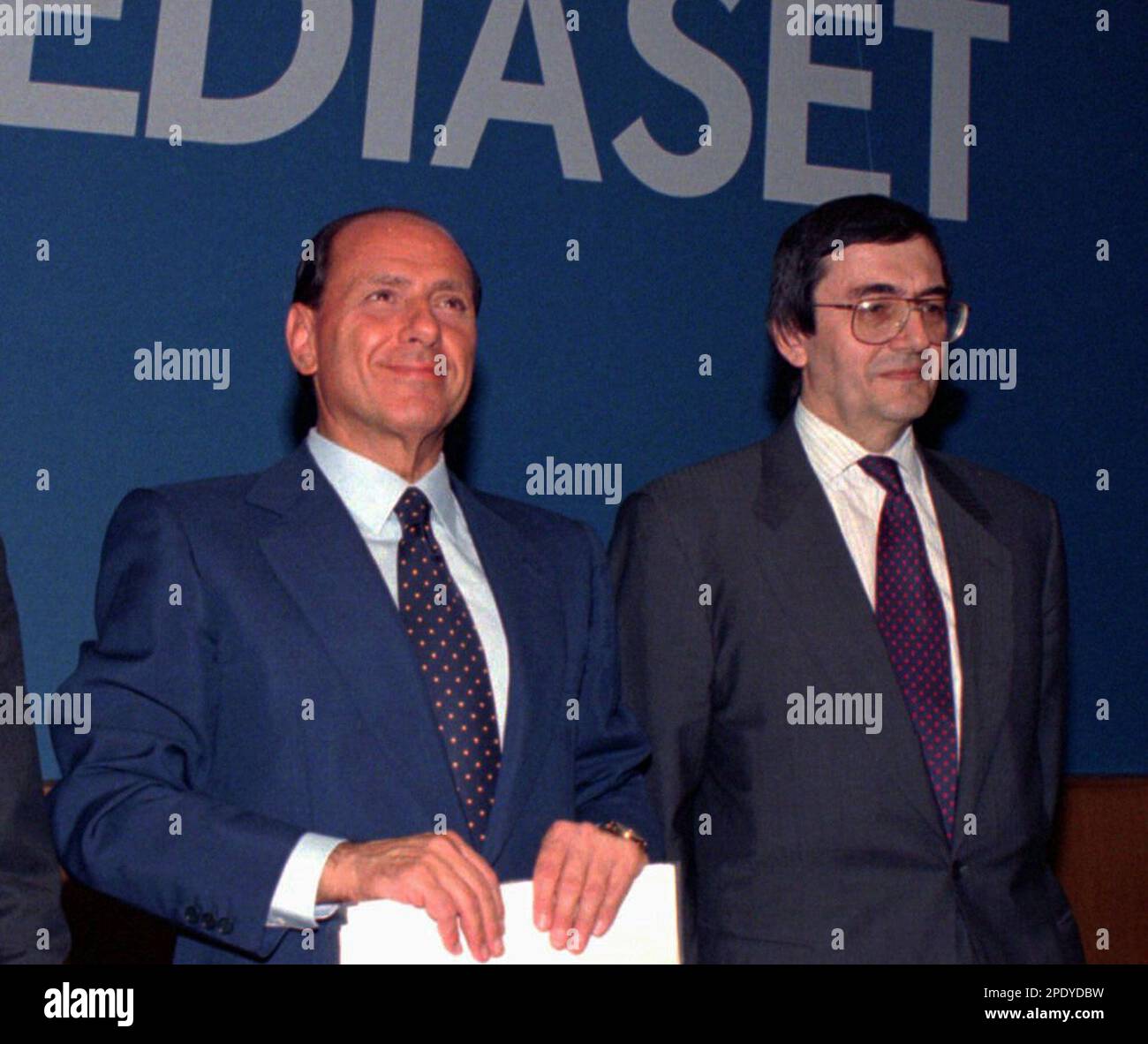 ** FILE ** Silvio Berlusconi, left, and Ubaldo Livolsi are shown in ...