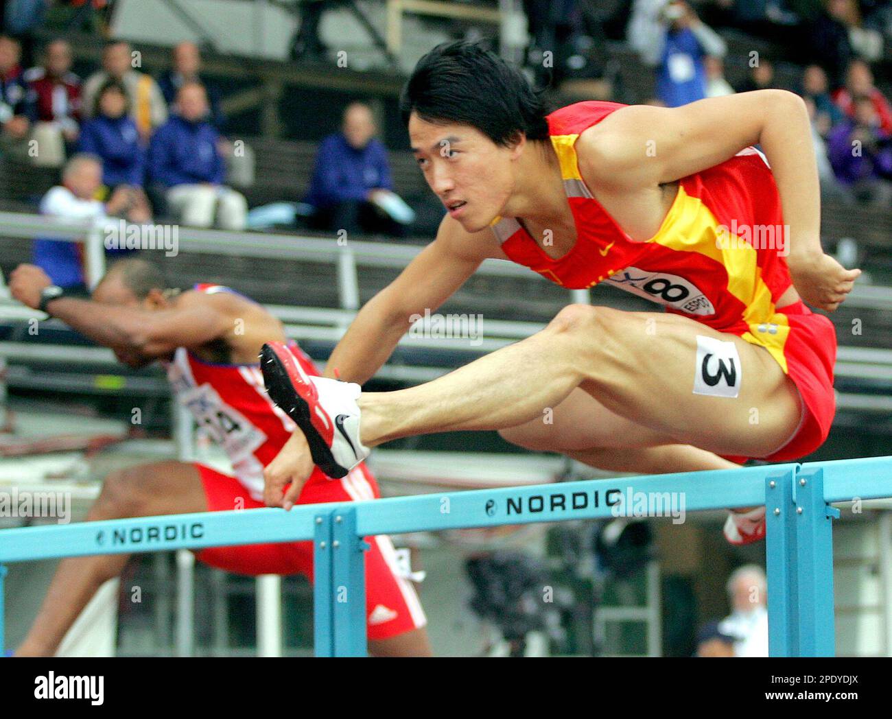 China's Xiang Liu, right, and Cuba's Anier Garcia in action during ...