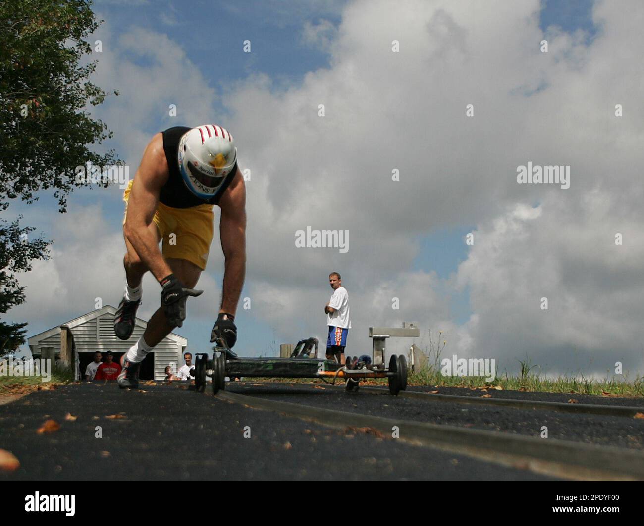 Wearing his signature American Eagle helmet, Jim Shea Jr. races down ...