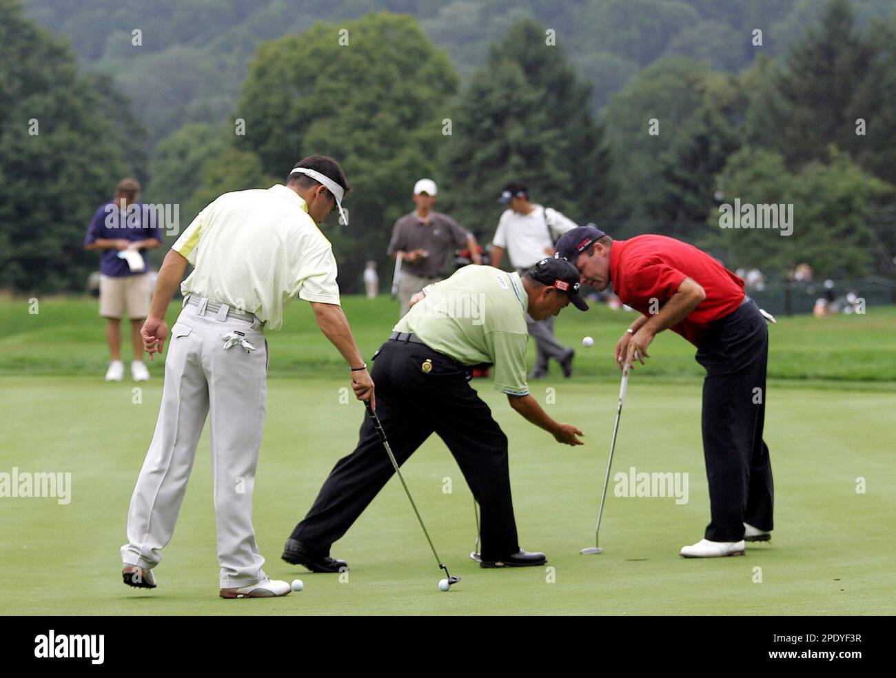 Japan's Shigeki Maruyama, left, Toru Taniguchi, center, and Thomas ...